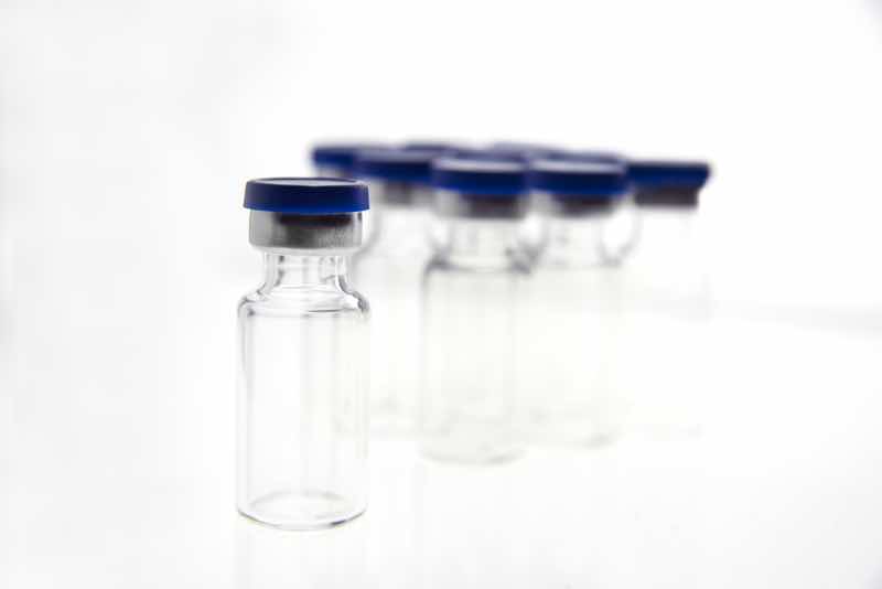 Addressing glass particulates in injectable drug formulations